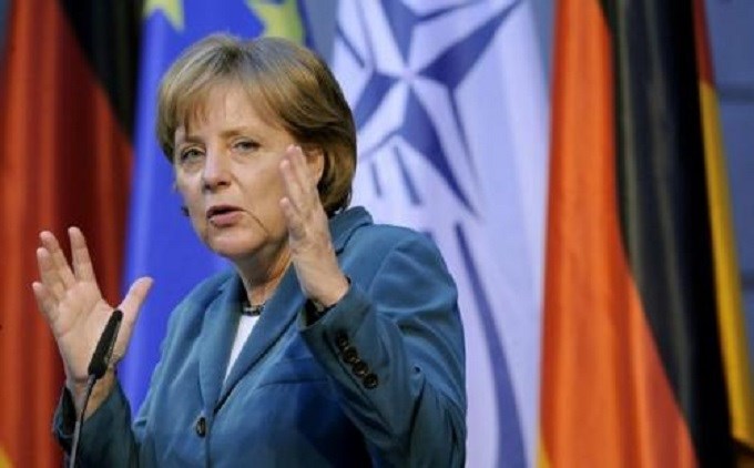 Merkel rearming Germany | Defend Democracy Press